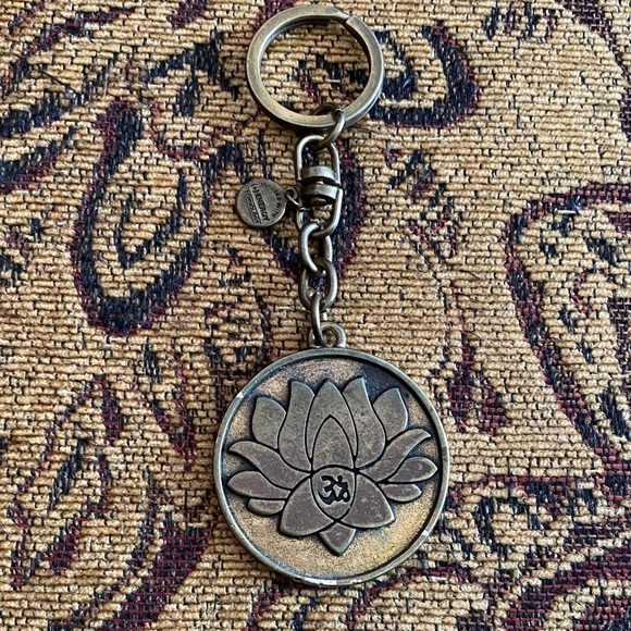 Alex and Ani | Accessories | Lotus Flower Keychain With Om Symbol ...